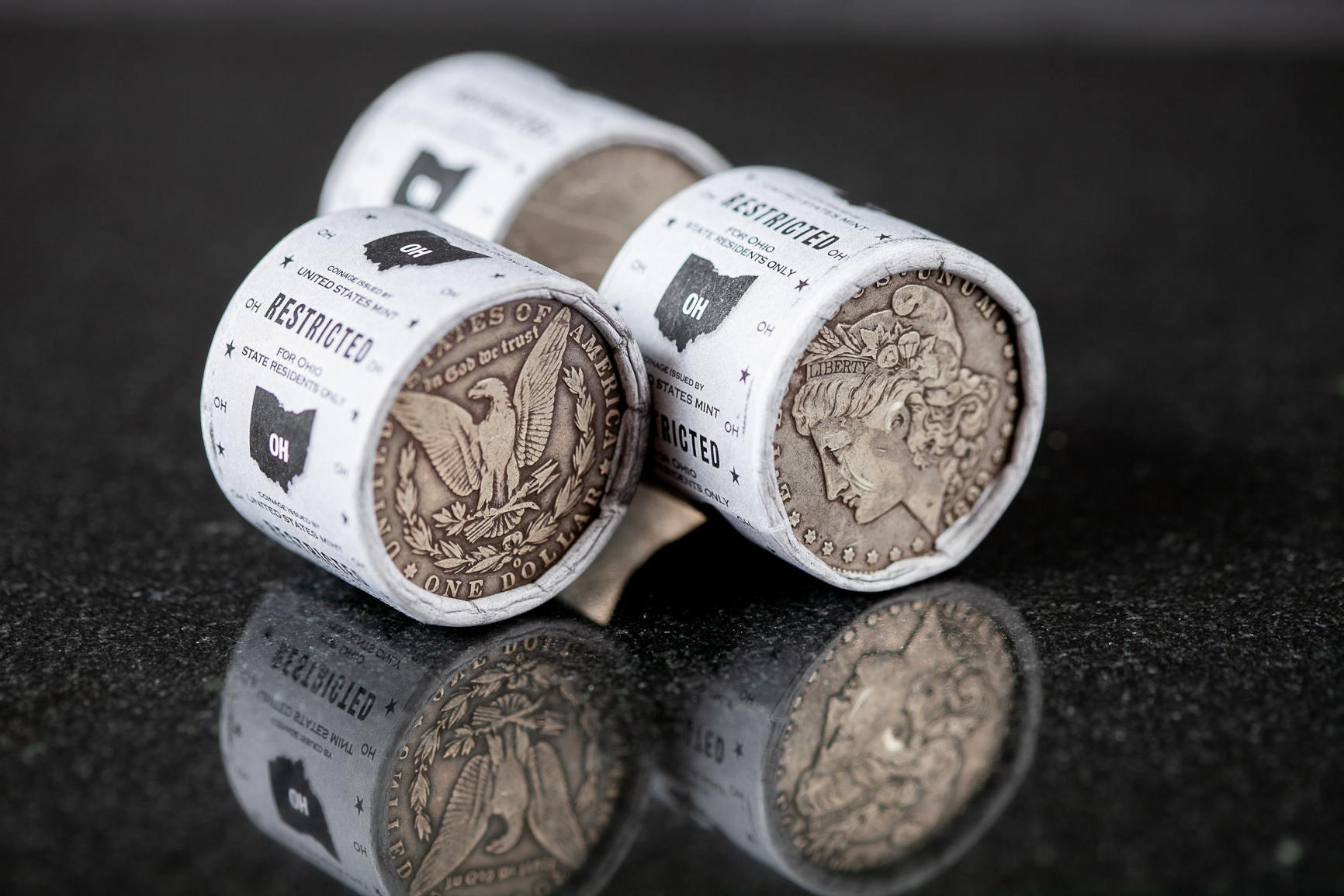 State Morgan Silver Dollars Rolls - Lincoln Treasury