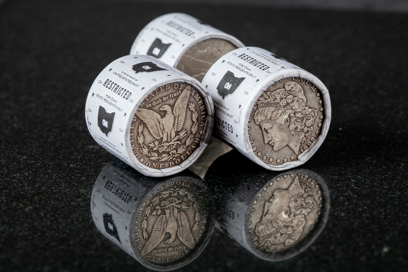 State Morgan Silver Dollars Rolls - Lincoln Treasury